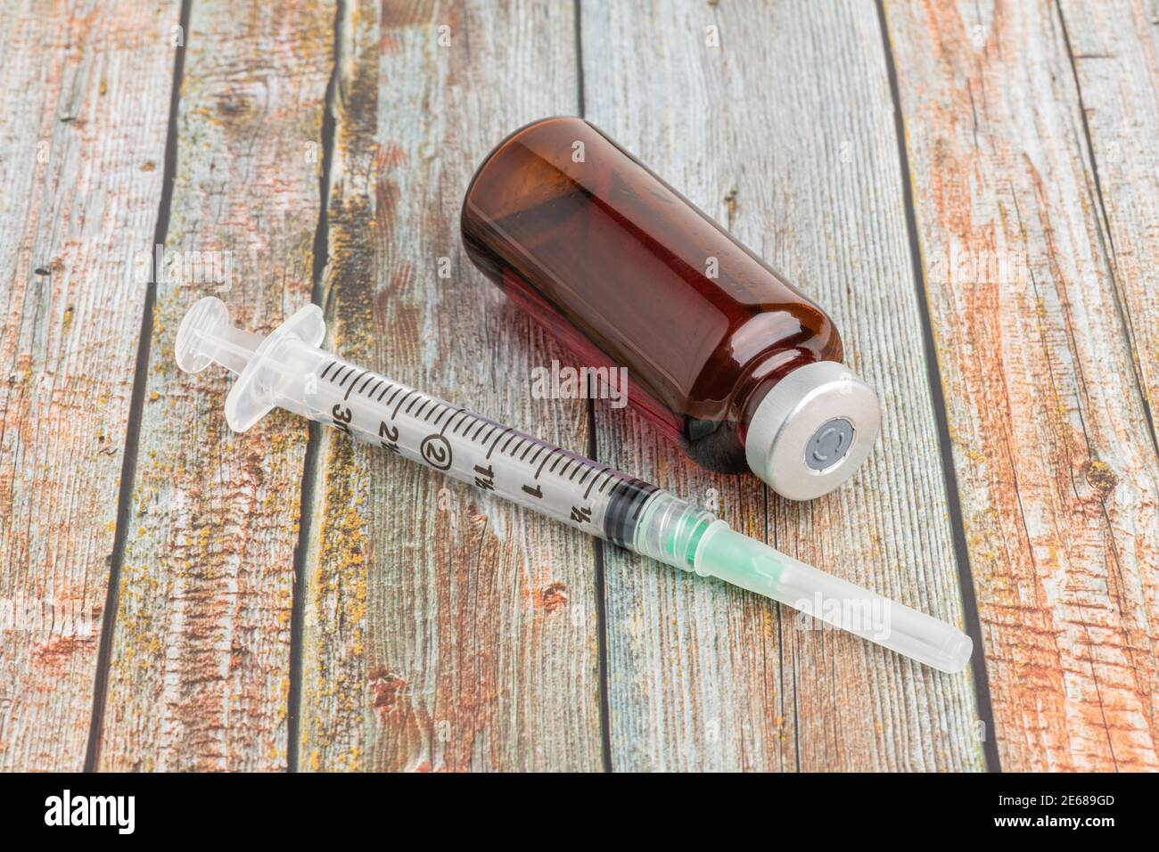 A close-up shot of a hygienic single-use plastic disposable syringe ...