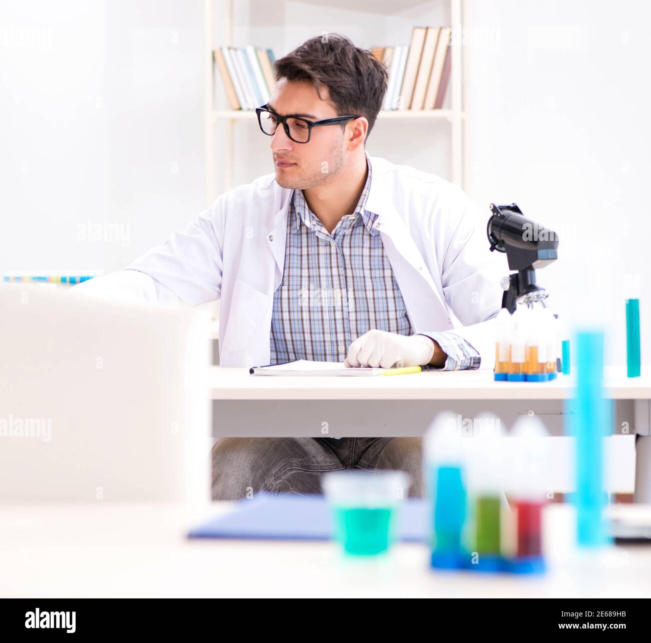 Chemistry student doing chemical experiments at classroom activity ...