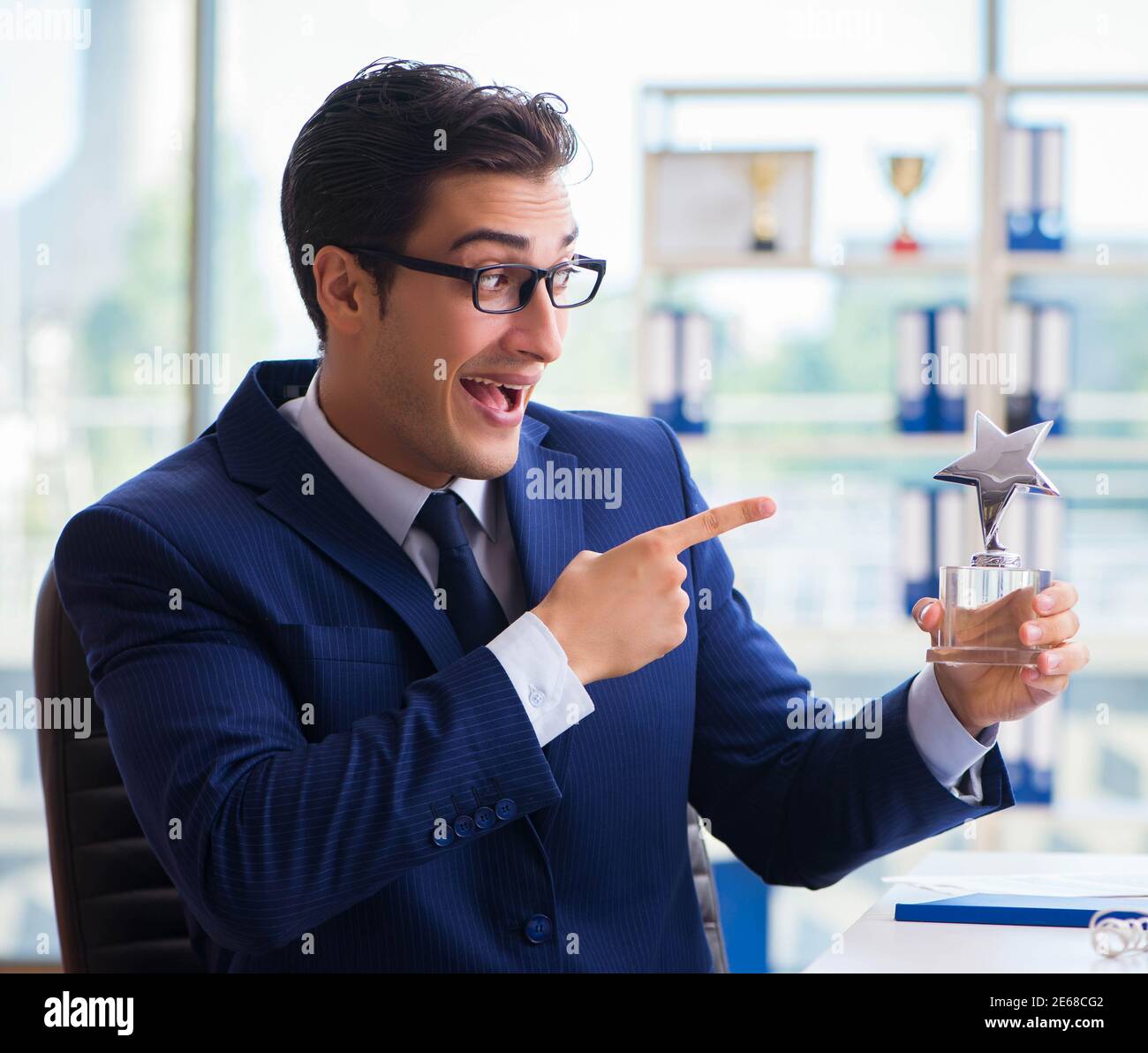 The businessman winning best employee of the month award Stock Photo ...