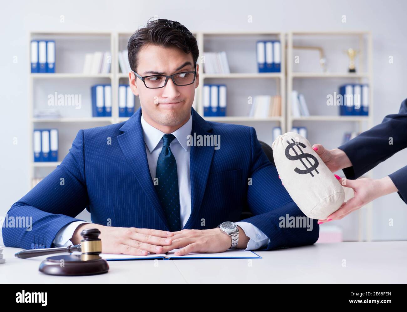 The judge in bribe concept with money Stock Photo - Alamy