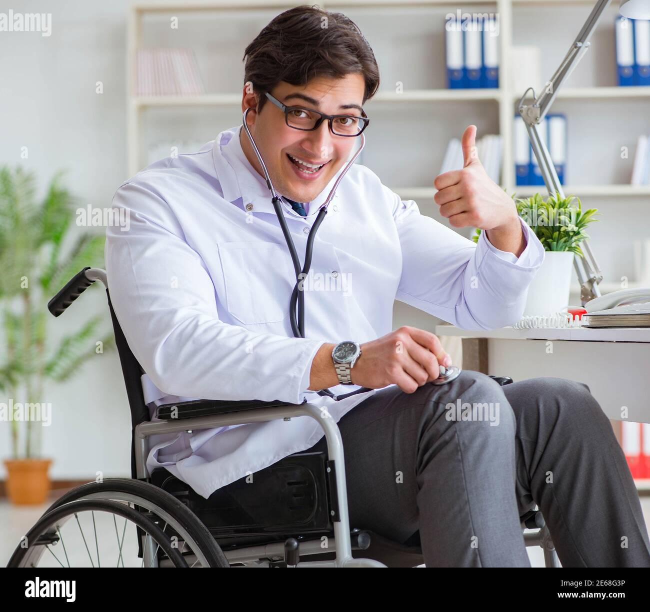 The disabled doctor on wheelchair working in hospital Stock Photo - Alamy