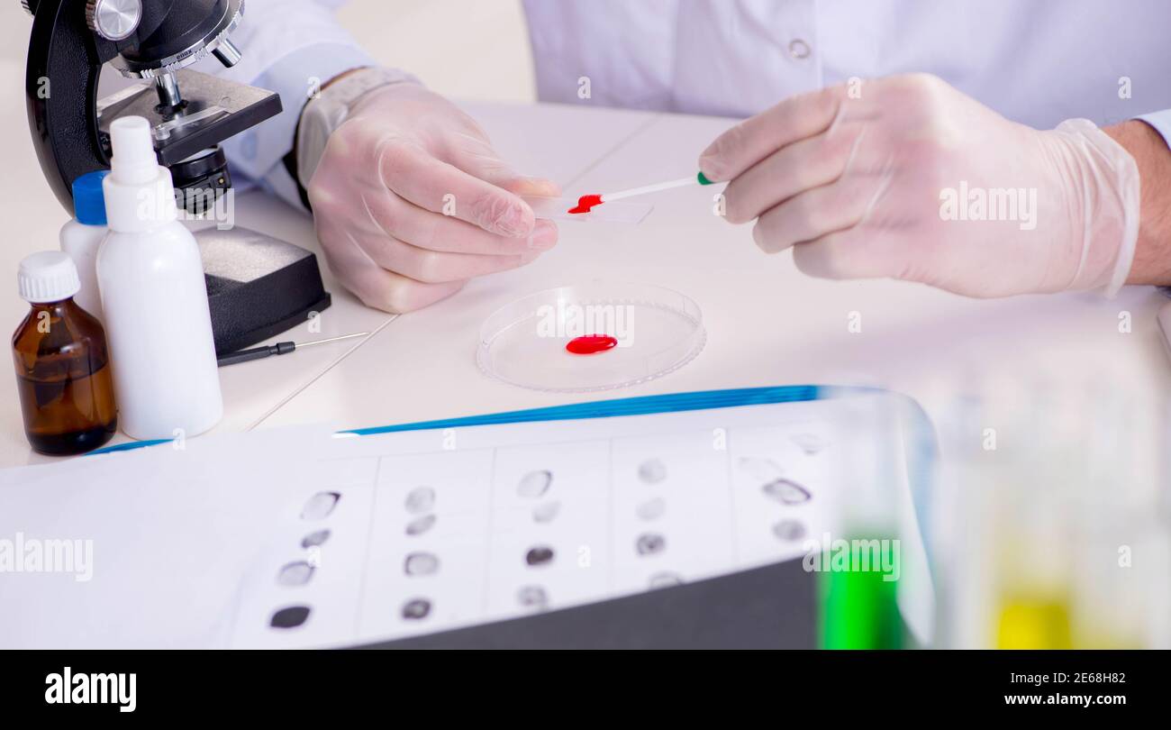 The drug synthesis lab experimentnig with pills Stock Photo - Alamy