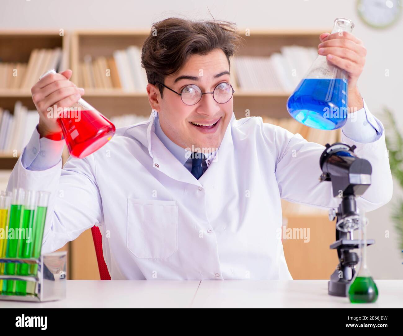 The mad crazy scientist doctor doing experiments in a laboratory Stock ...