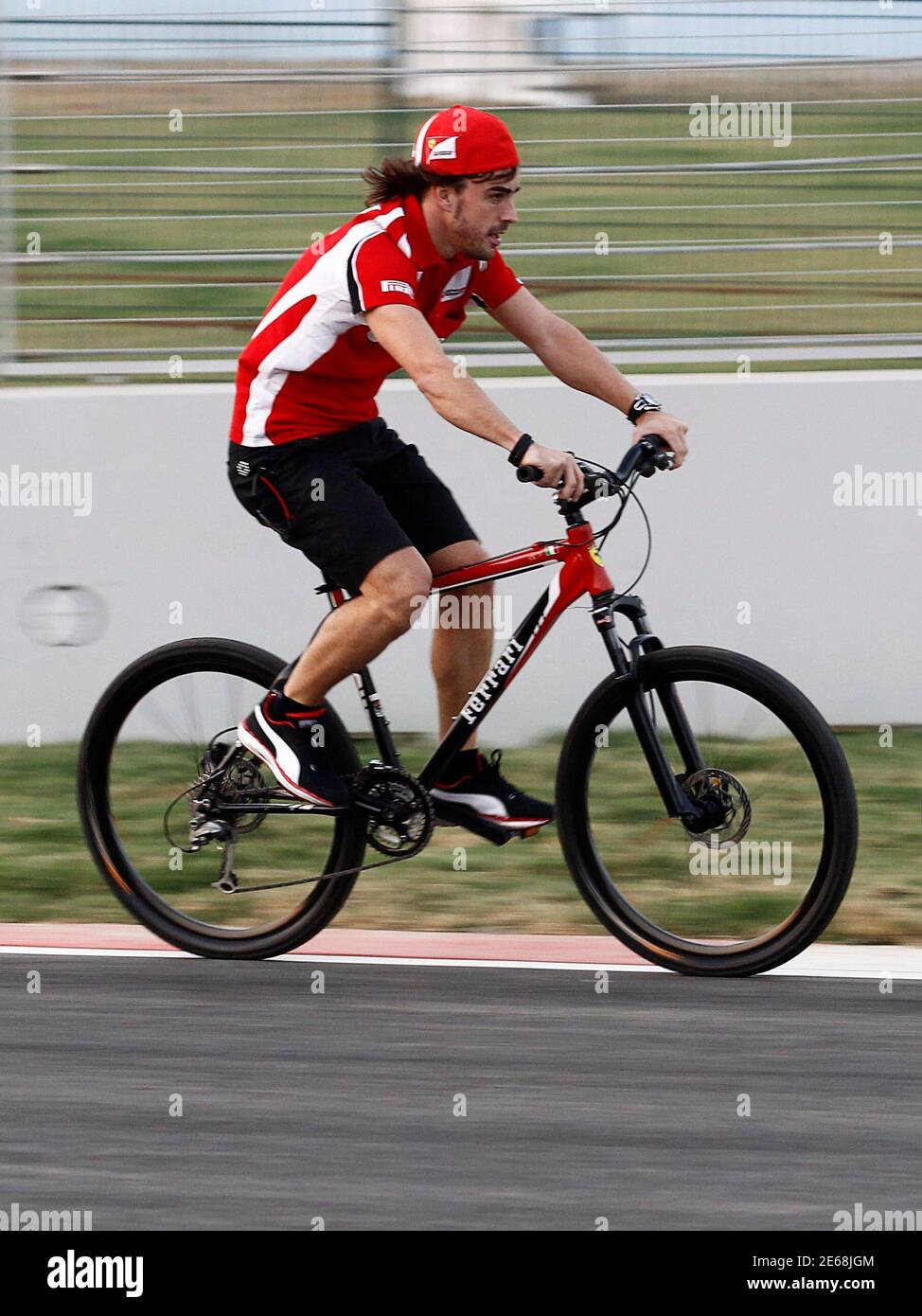 Ferrari rides circuit on a bicycle hi-res stock photography and images ...