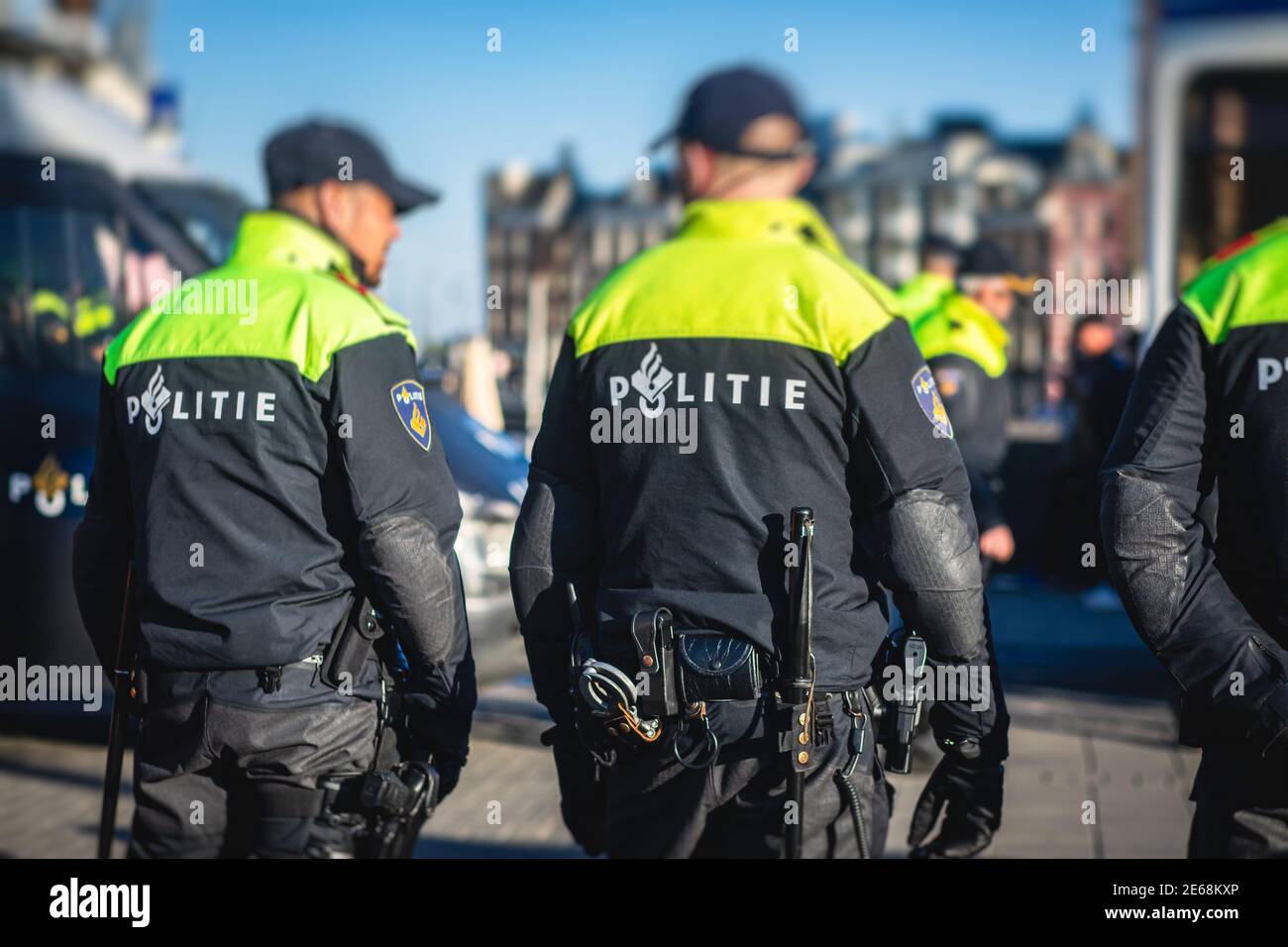 Dutch police squad formation and horseback riding mounted police back ...