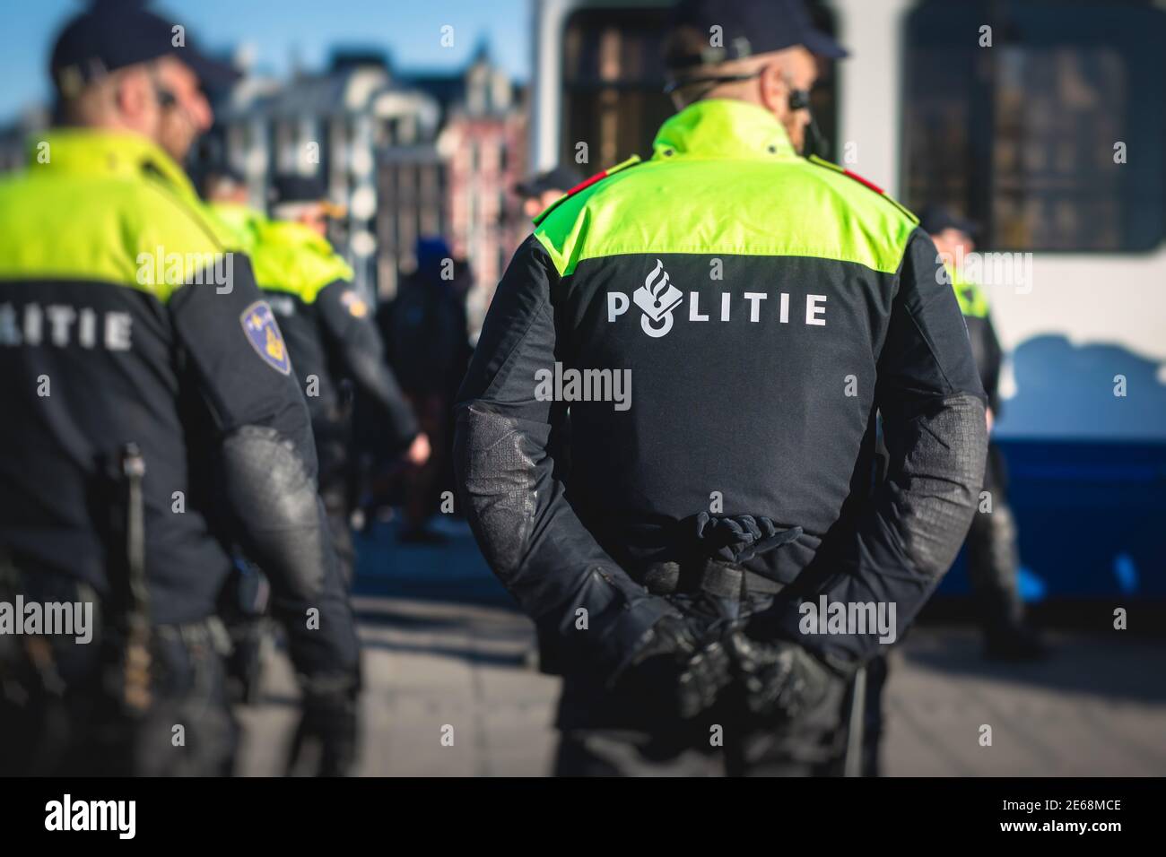 Dutch police squad formation and horseback riding mounted police back ...