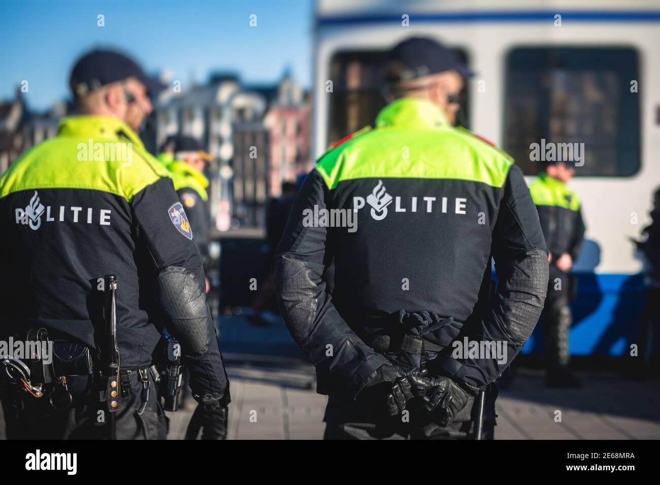 Dutch police squad formation and horseback riding mounted police back ...