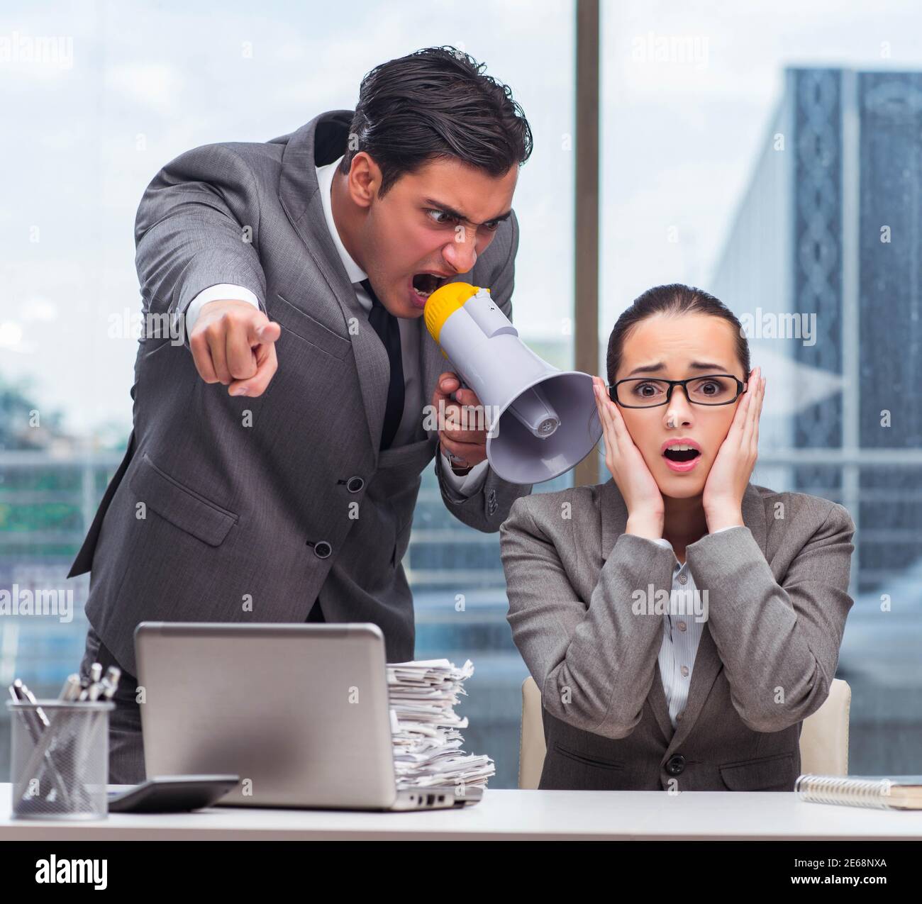 The boss yelling at his team member Stock Photo - Alamy