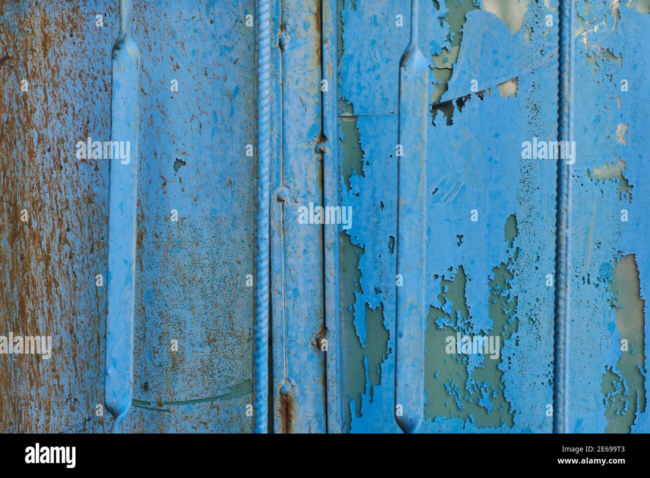 Plate of rusty blue metal texture with faint color corroded with age ...