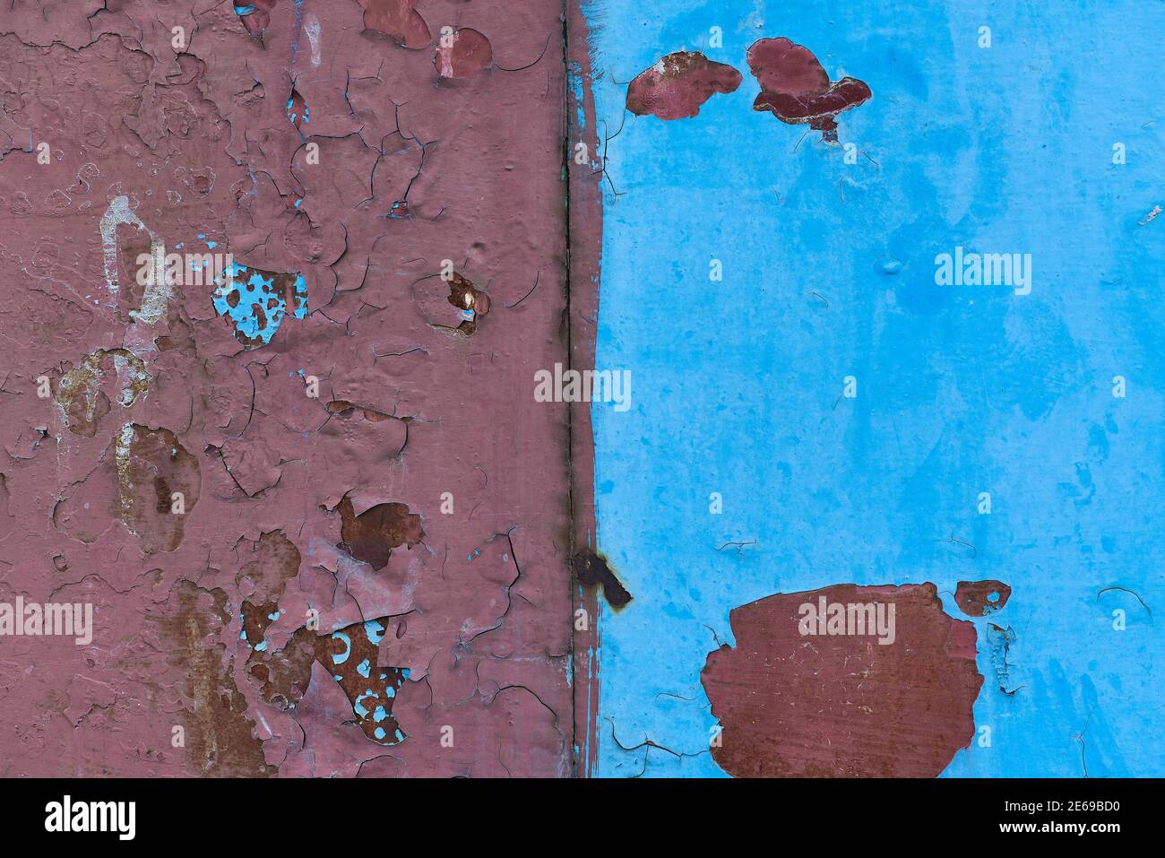 Plate of metal rusty texture with traces of black paint faint color ...