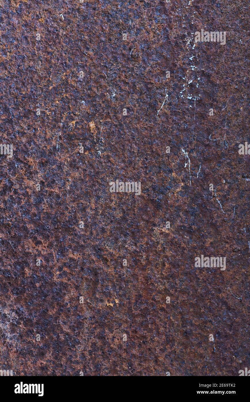 Plate of metal rusty texture with traces of a paint faint color ...