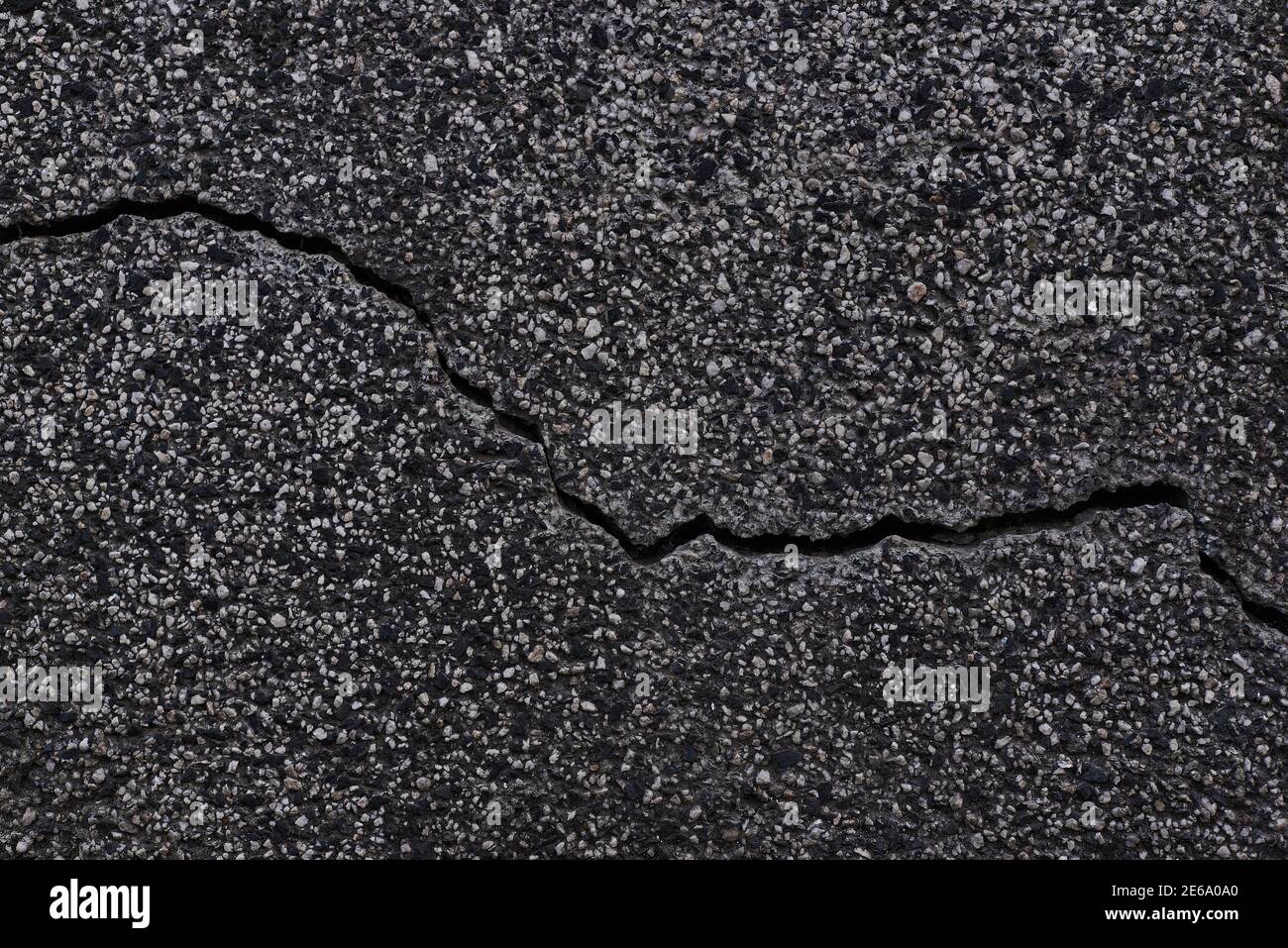 Dark texture of old broken asphalt road or wall big abrasions cracks on ...