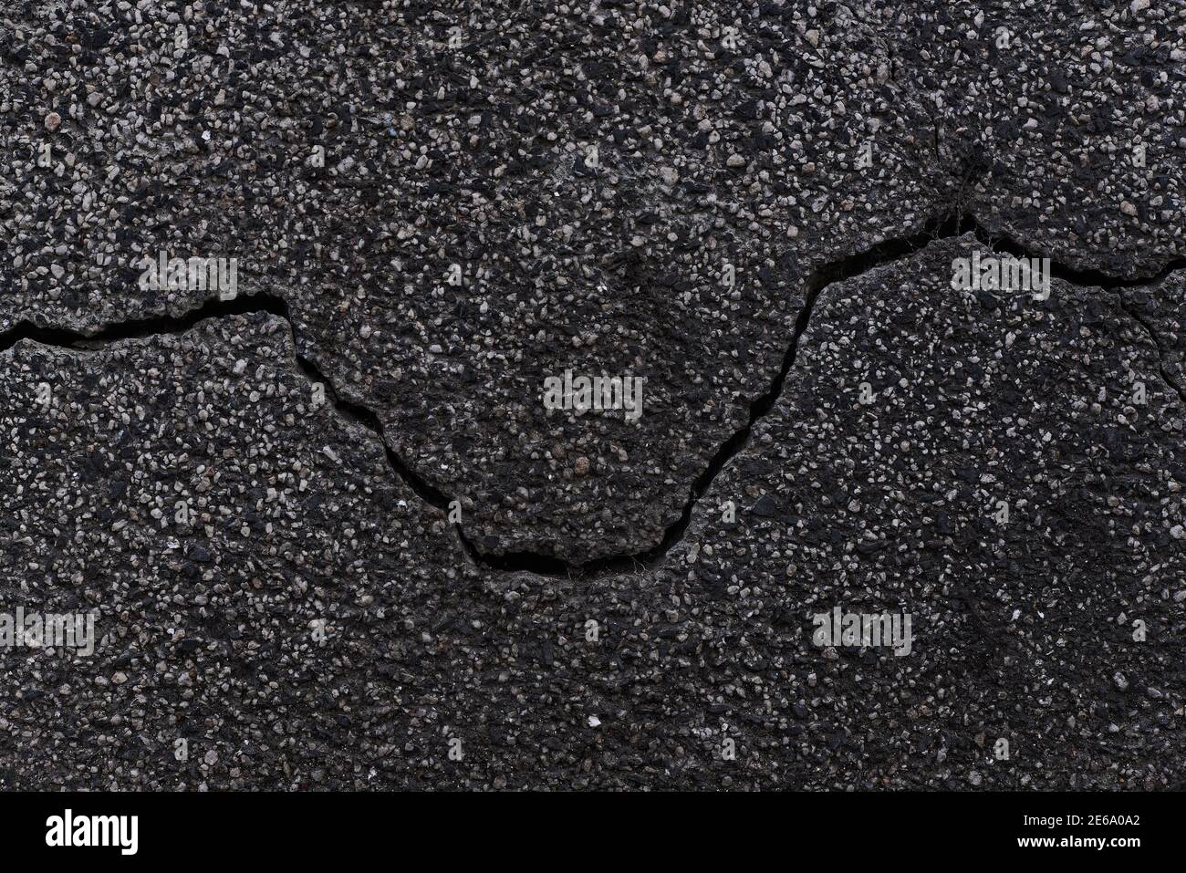 Dark texture of old broken asphalt road or wall big abrasions cracks on ...