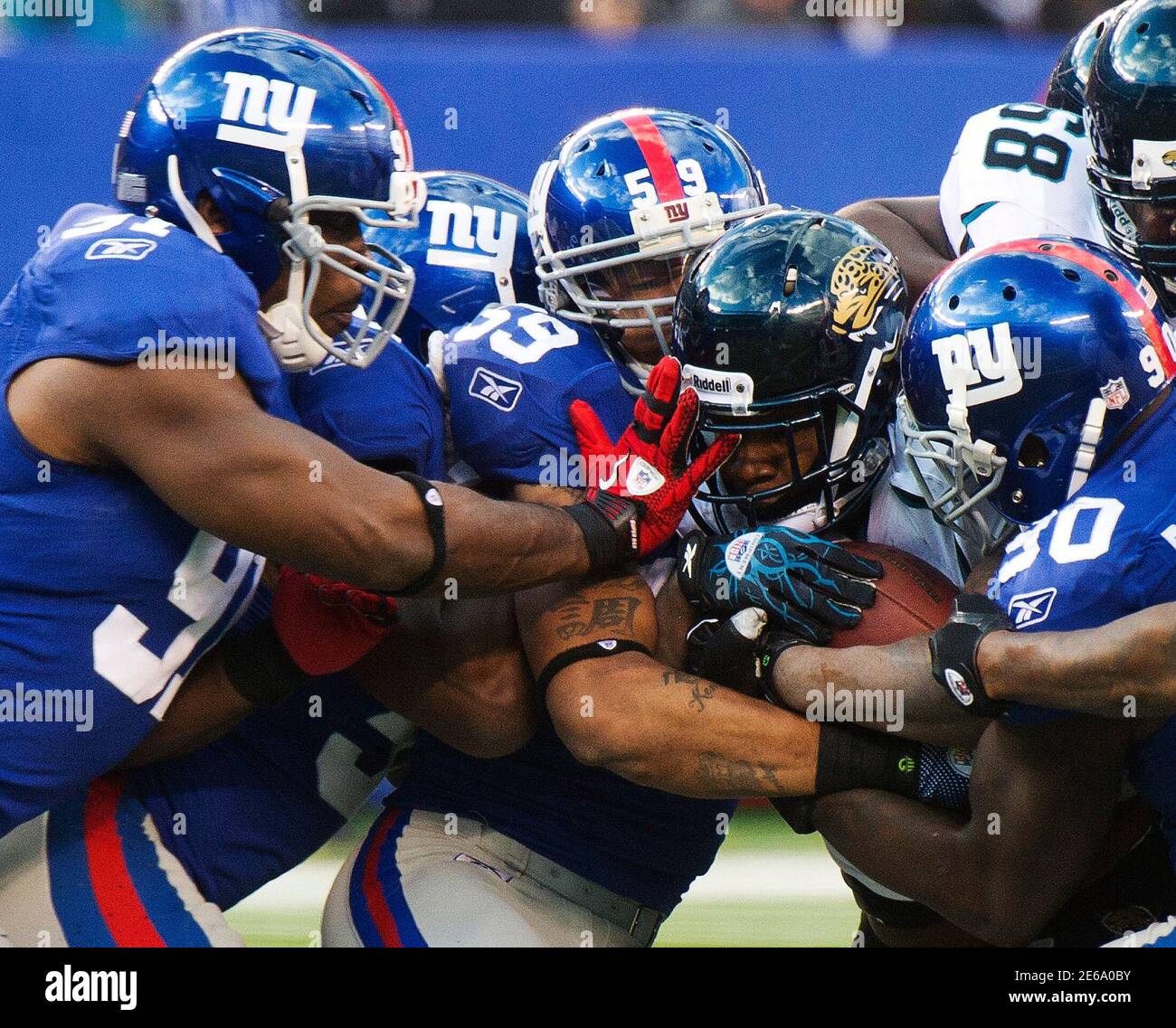 Gang tackle hi-res stock photography and images - Alamy