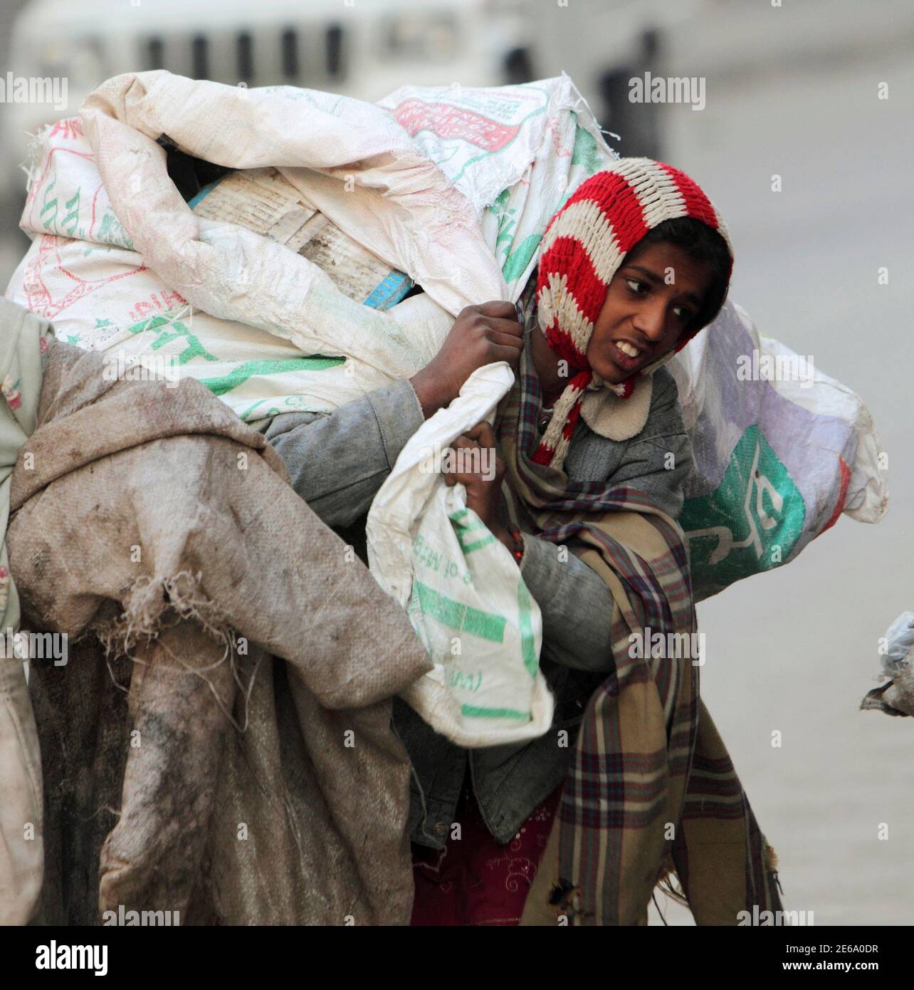 Child carries heavy bag hi-res stock photography and images - Alamy
