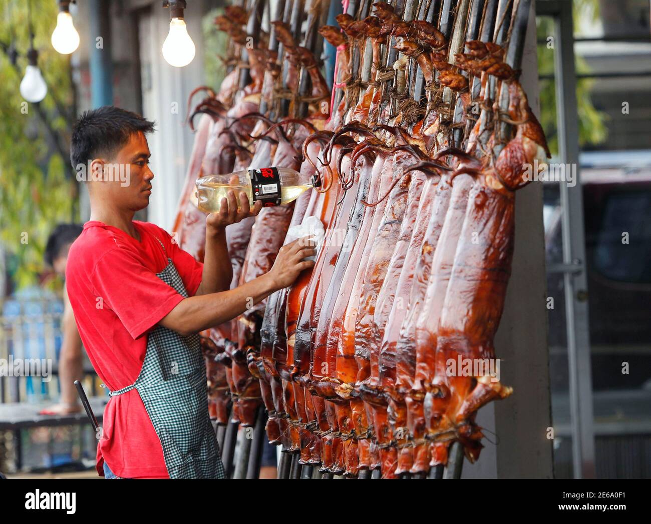 Lechon worker hi-res stock photography and images - Alamy