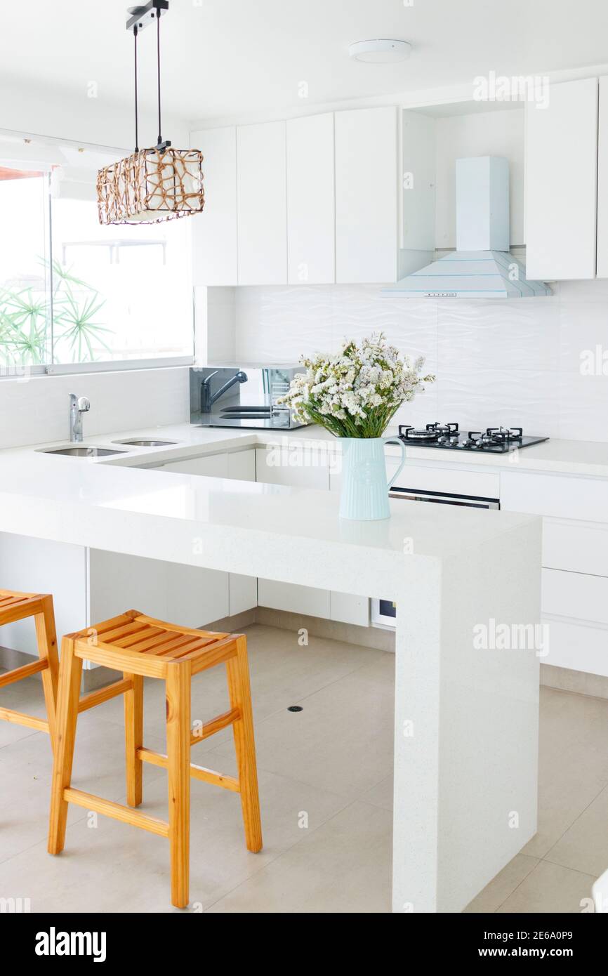 Cute flower arrangement in a home kitchen Stock Photo - Alamy