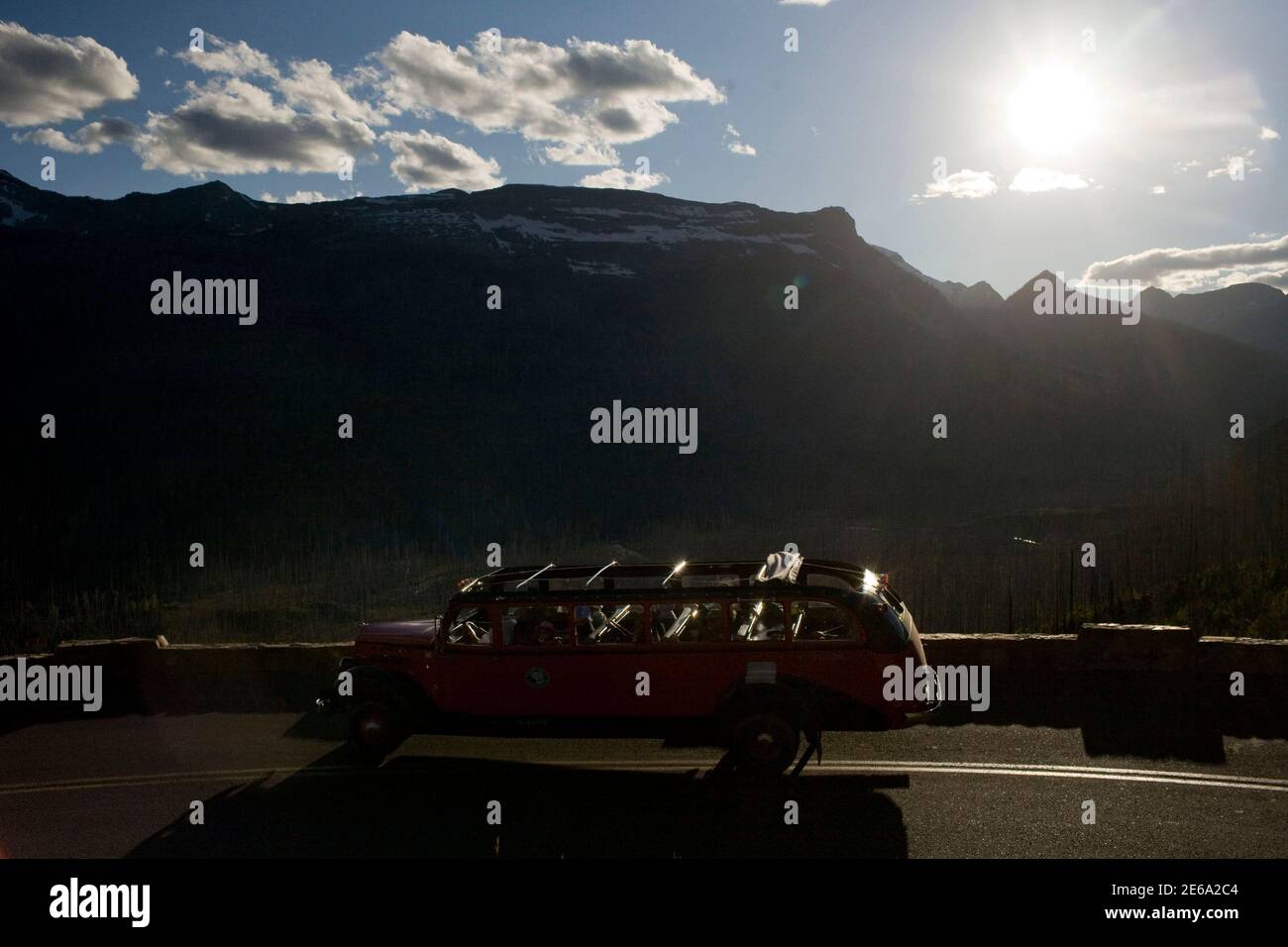 Red bus tours glacier national hi-res stock photography and images - Alamy