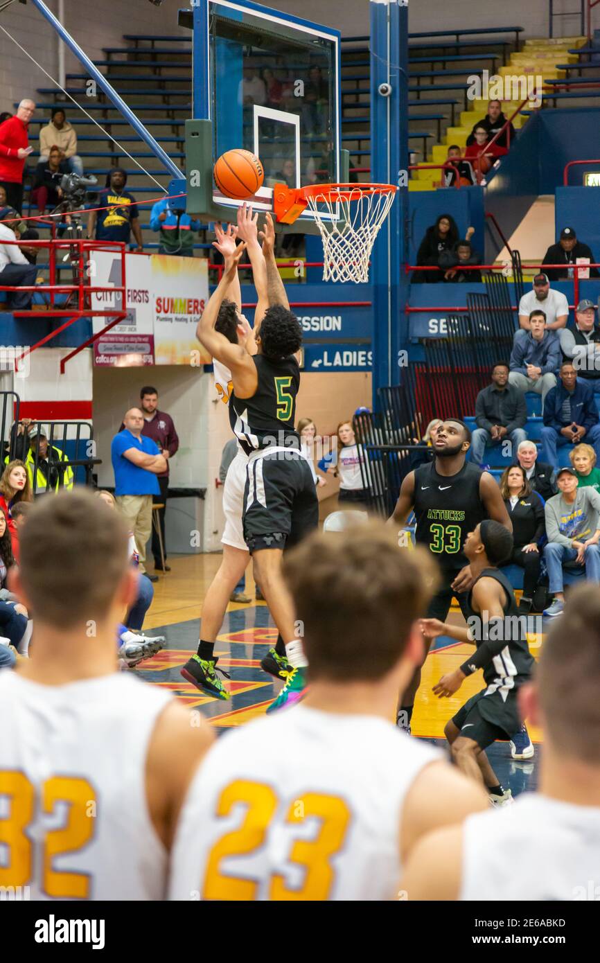 A contested shot can be seen through the bench during the 2020 ...