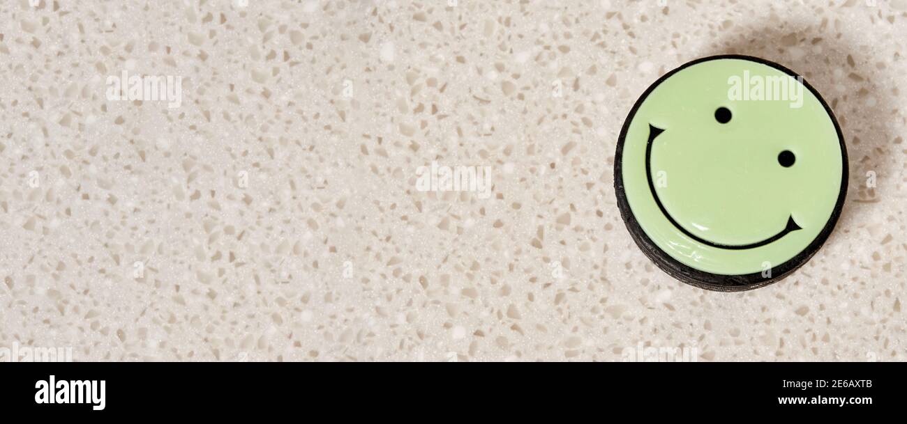 Canada hockey puck with a smiling round emoji on it. International day ...