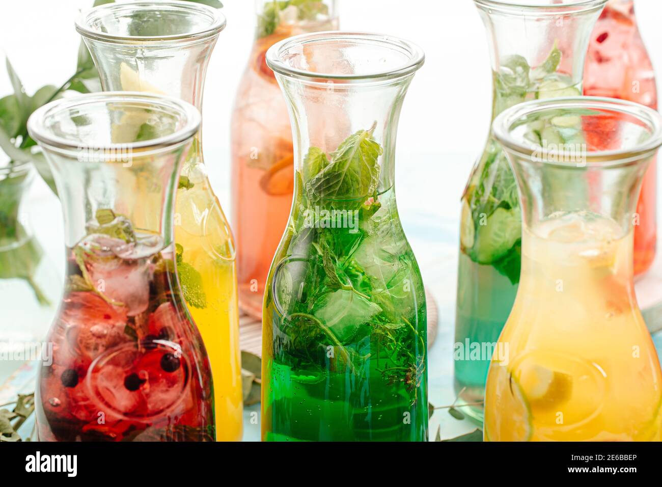 Side view on assorted fresh fruit lemonades Stock Photo - Alamy