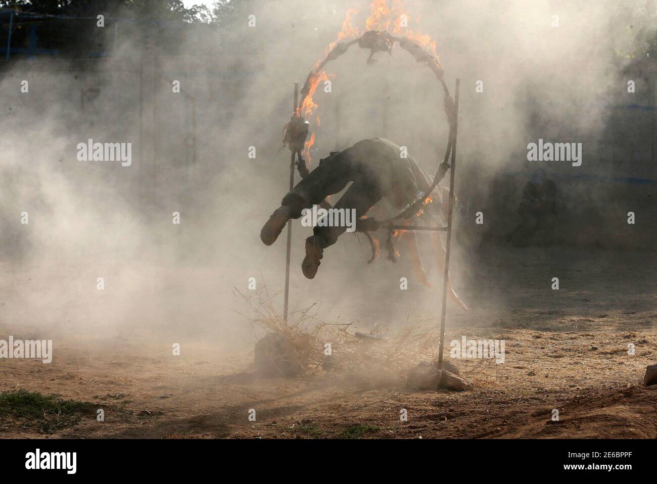 Jump through a fire hoop hi-res stock photography and images - Alamy