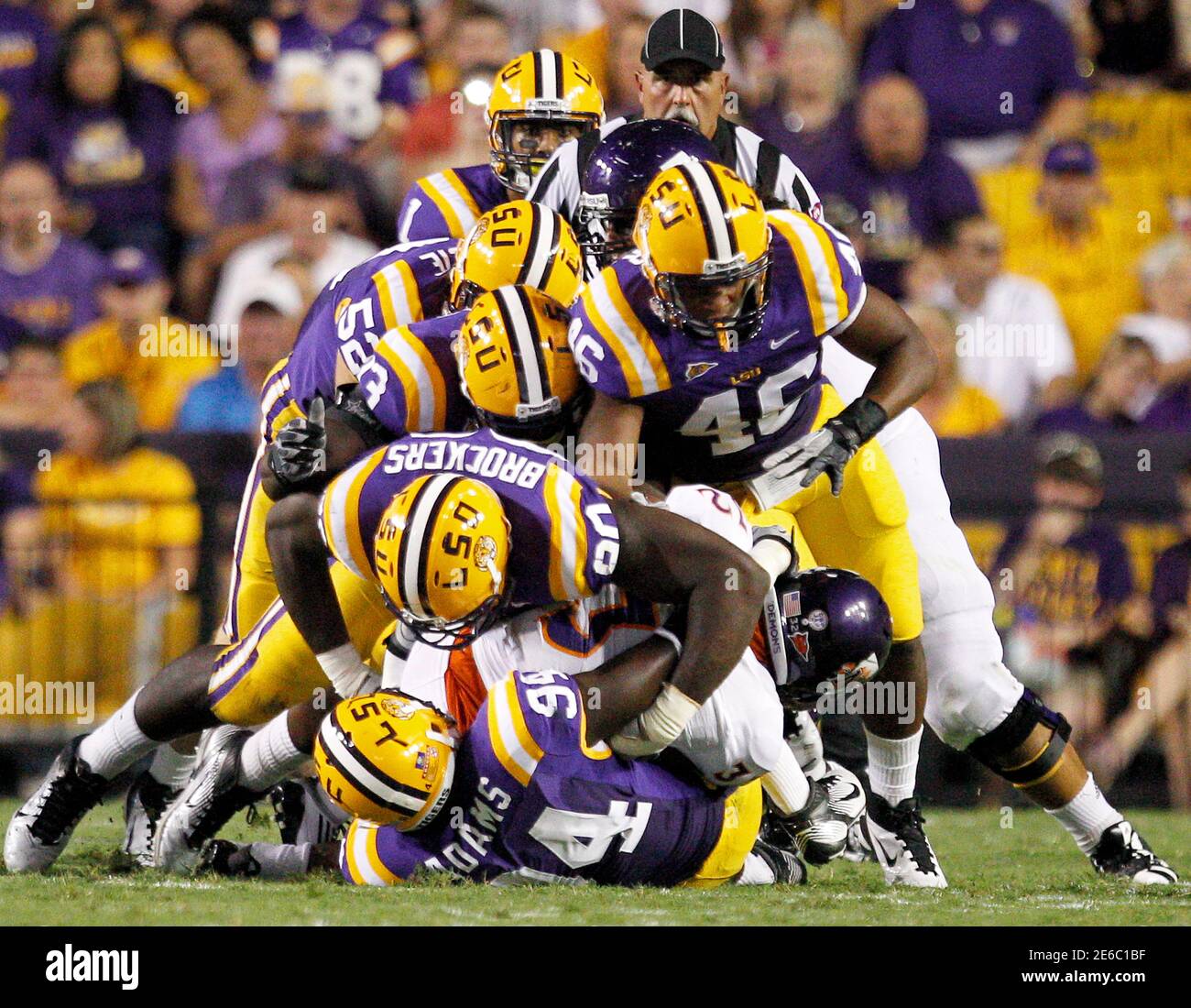 Gang tackle hi-res stock photography and images - Alamy