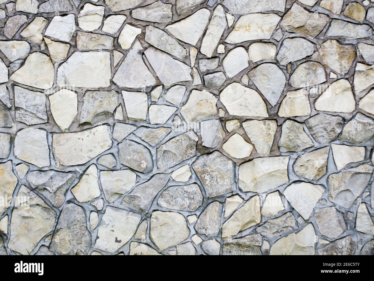 Stone wall texture with a random pattern Stock Photo - Alamy