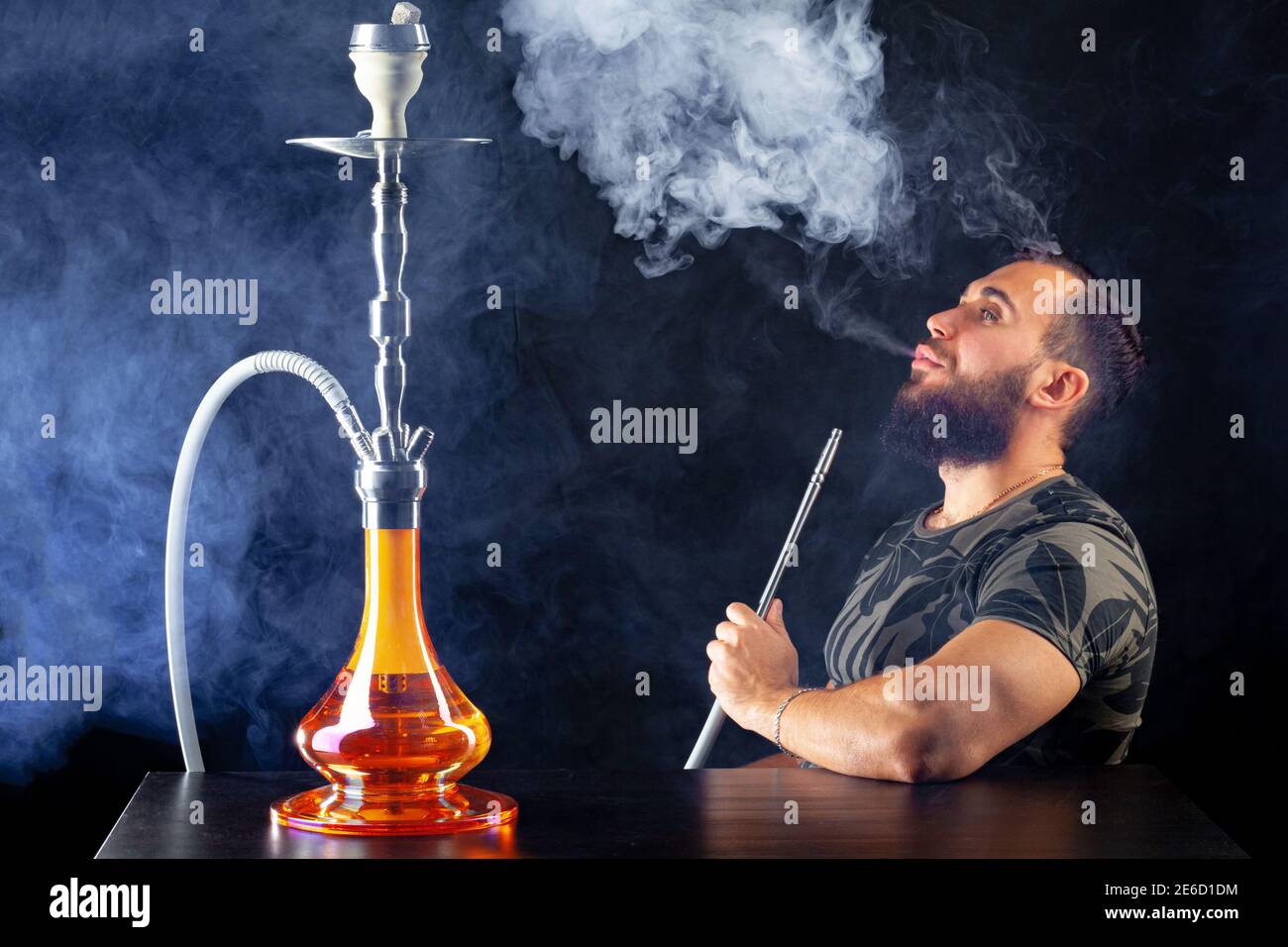 Man smoking shisha young hi-res stock photography and images - Alamy