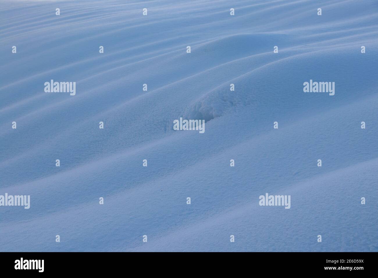 Snow patterns made by mother nature Stock Photo - Alamy