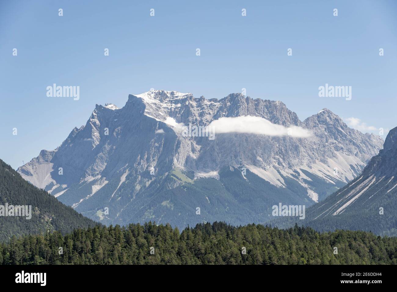 West side view of snowy Zugspitze from Fernpass Austria Blindsee lake ...