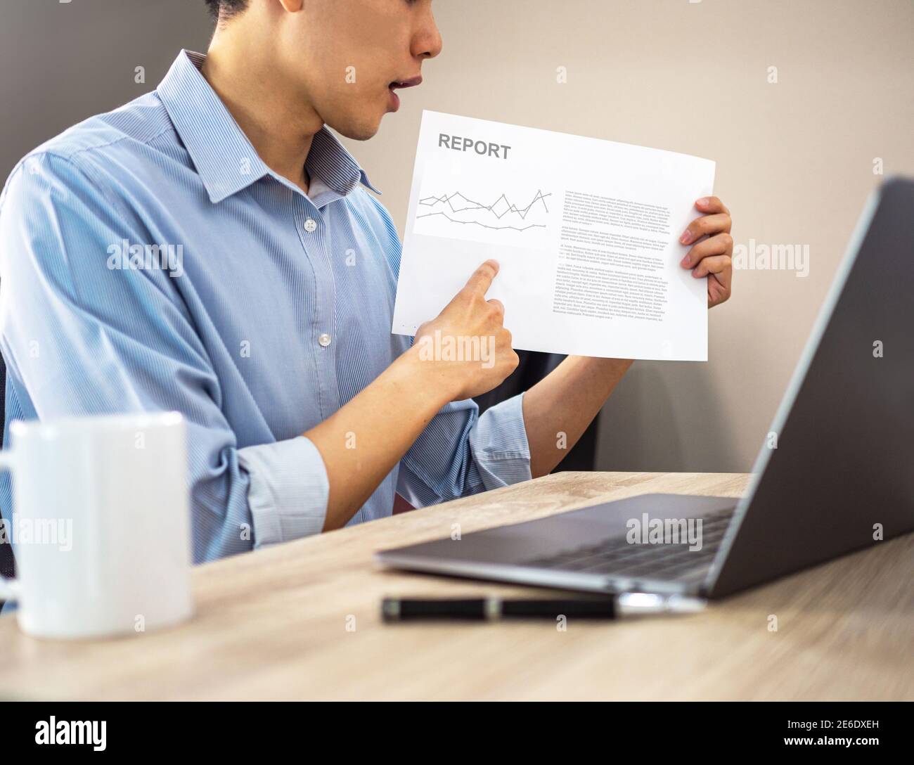Asian businessman presenting report hi-res stock photography and images ...