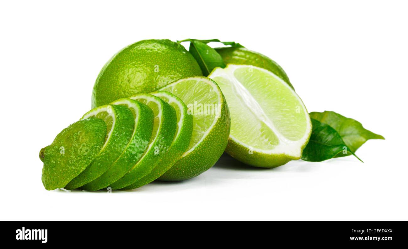 Pieces of lime isolated on white background Stock Photo - Alamy