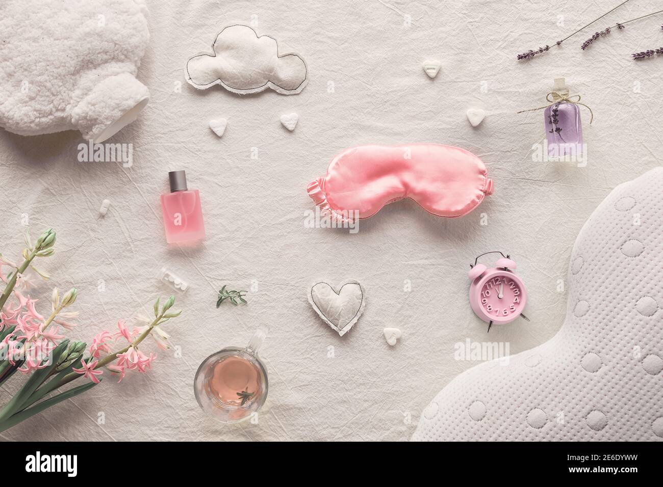 Healthy night sleep concept. Off white, ivory textile flat lay. Pink ...