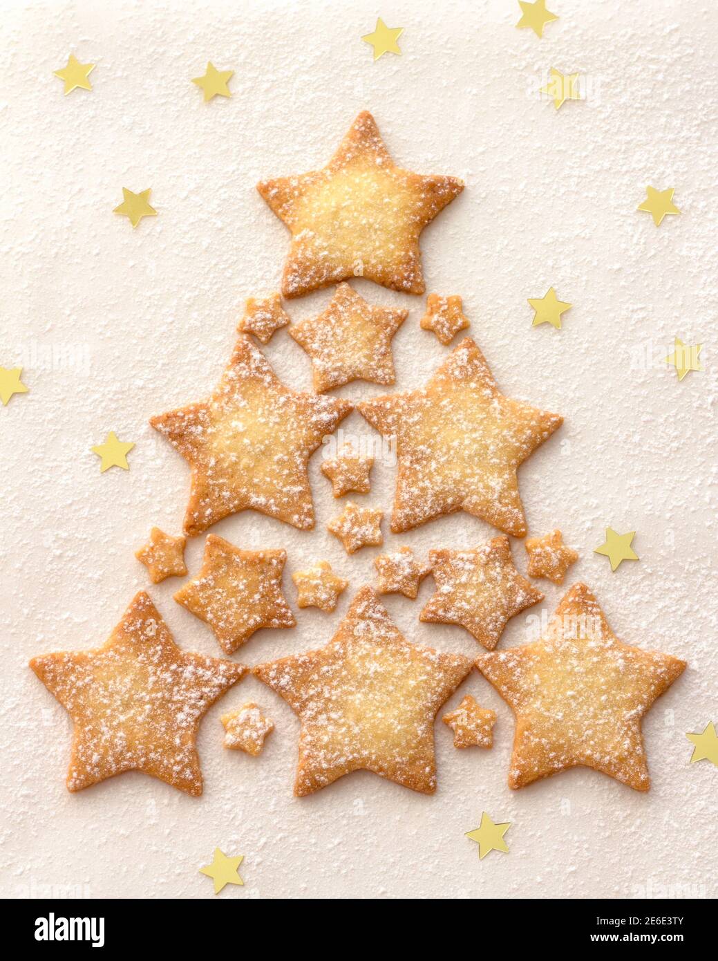 Christmas tree of a star cookie sprinkled with powdered sugar on a ...
