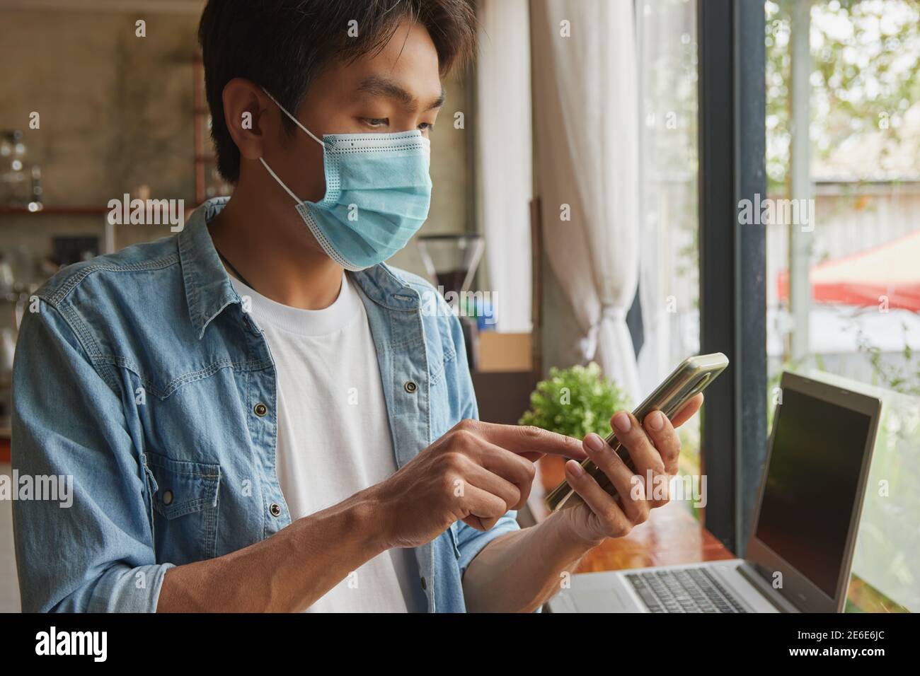 Indian work from home phone laptop hi-res stock photography and images ...