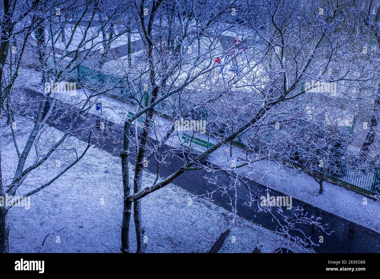 Snow in town Stock Photo - Alamy
