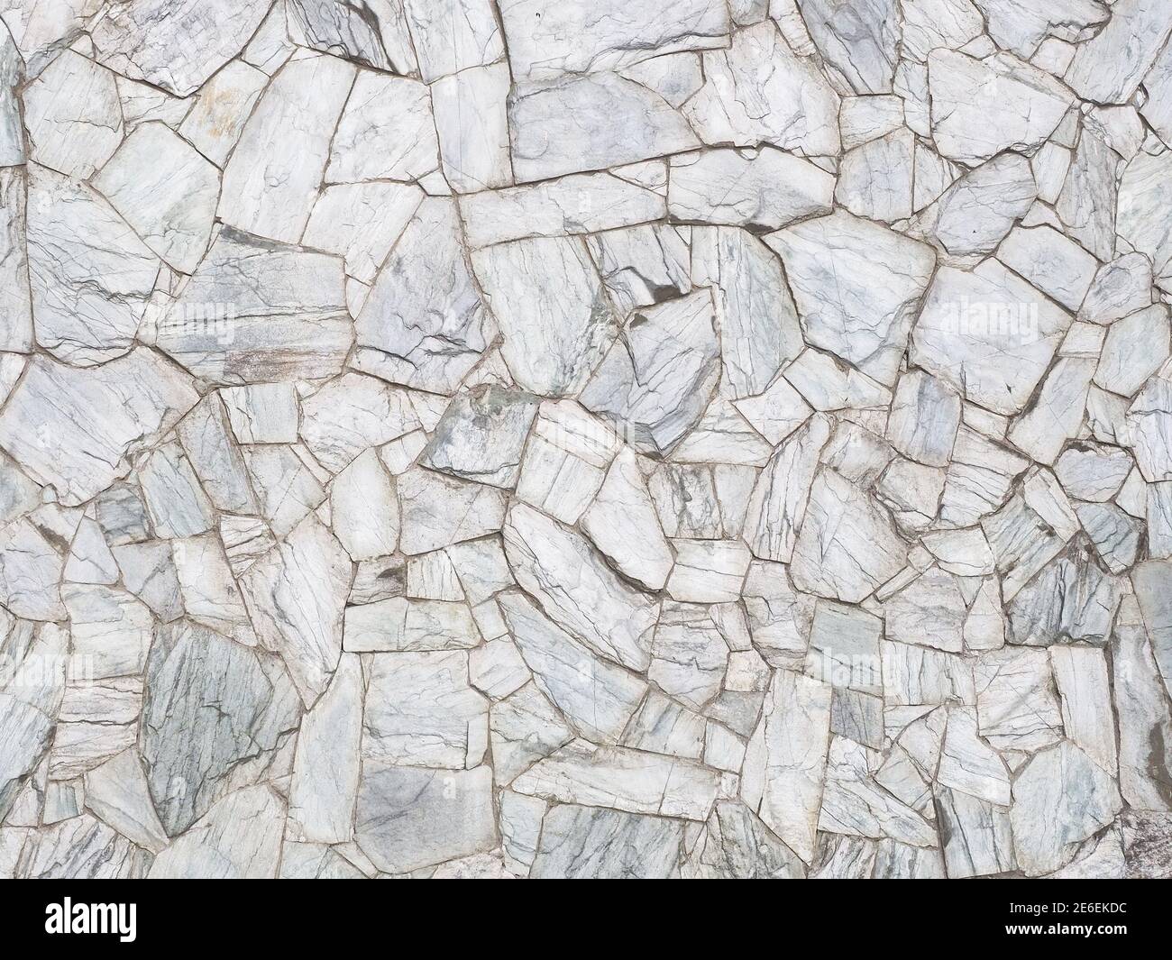 Wall clad in gray textured granite shards of different sizes Stock ...