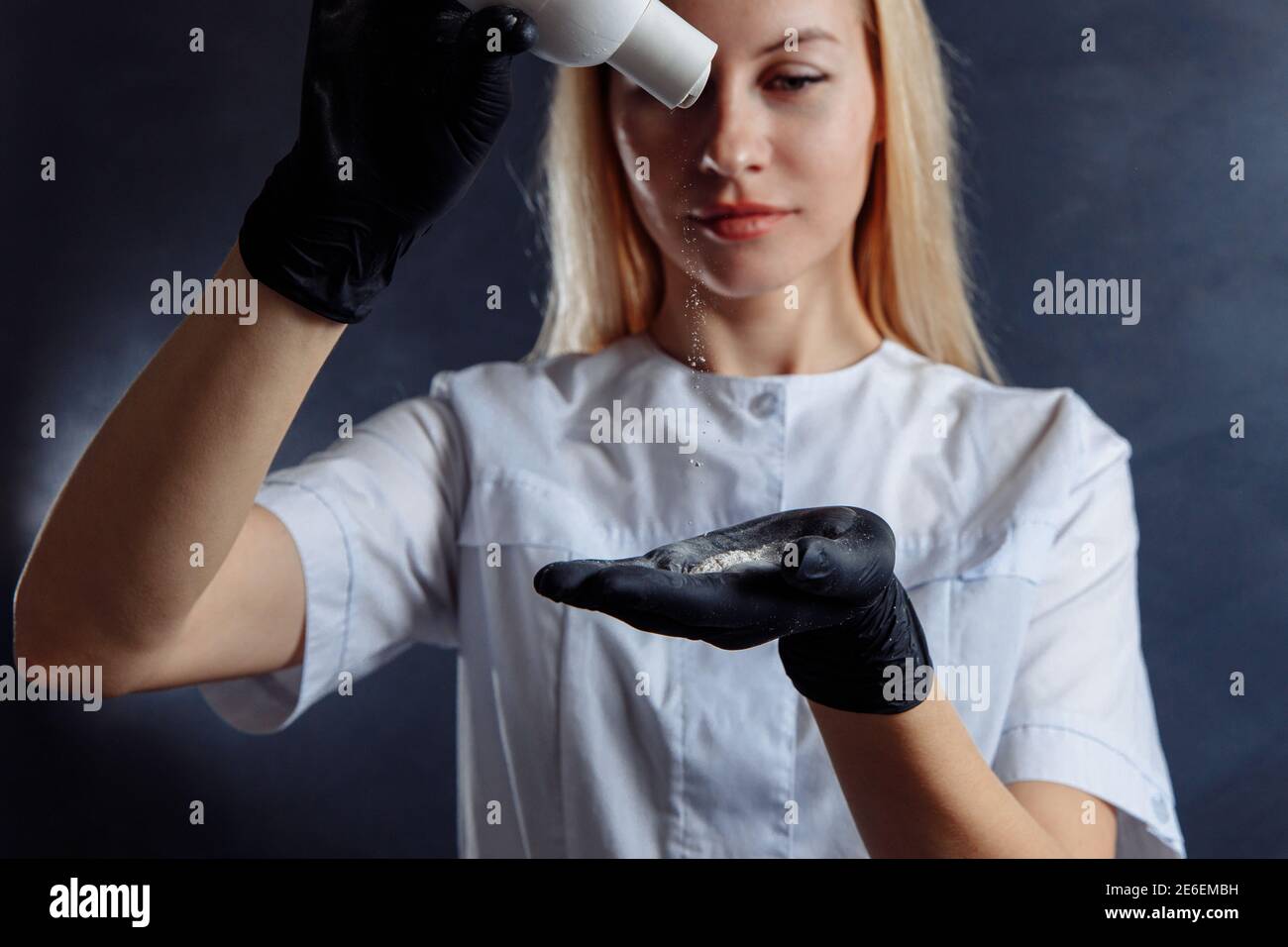 The epilation master prepares for the procedure Stock Photo - Alamy