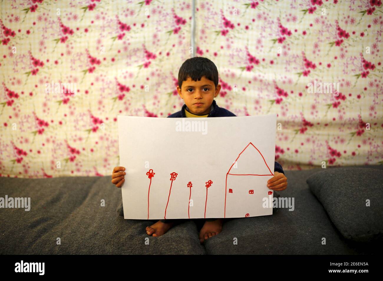 A boy shows his drawings hi-res stock photography and images - Alamy