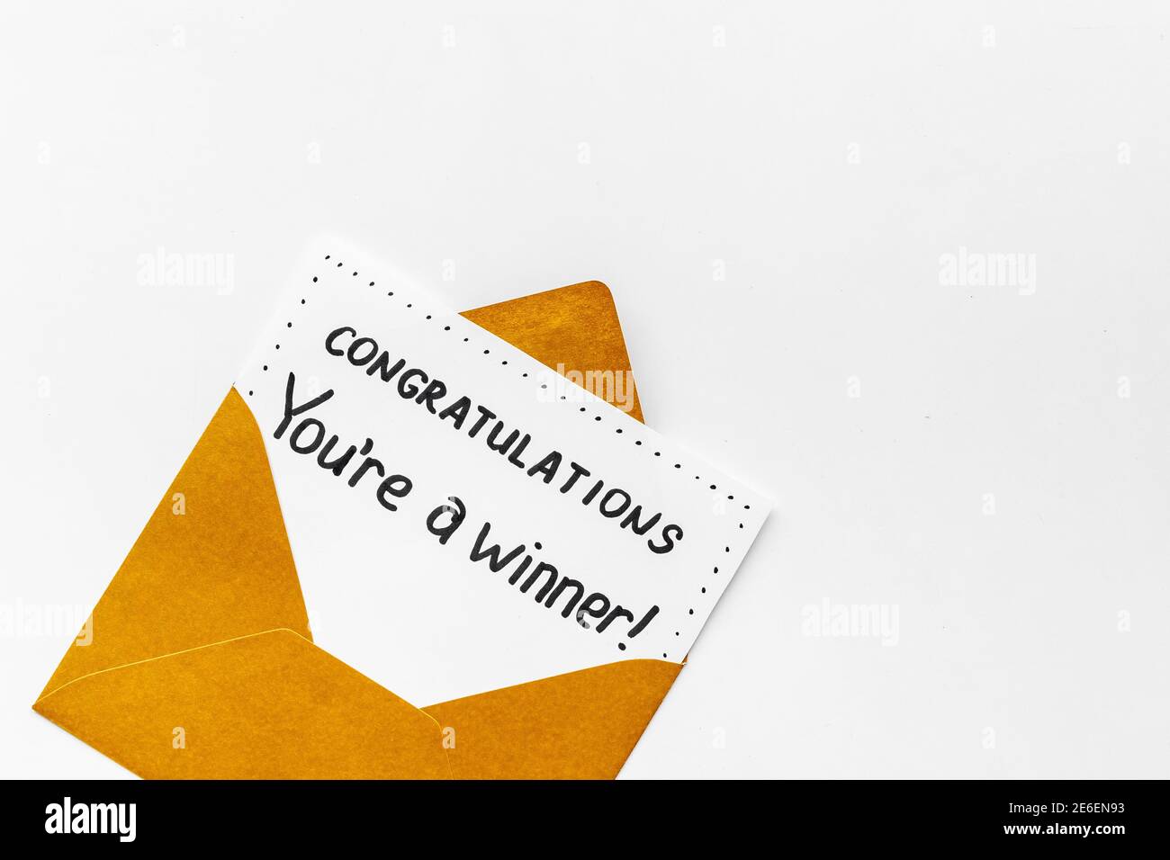 Congratulations award concept -You are a winner card in golden envelope ...