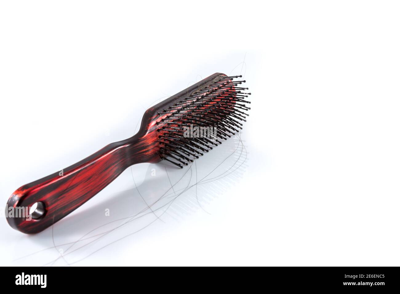 Comb and hair on white background Stock Photo - Alamy