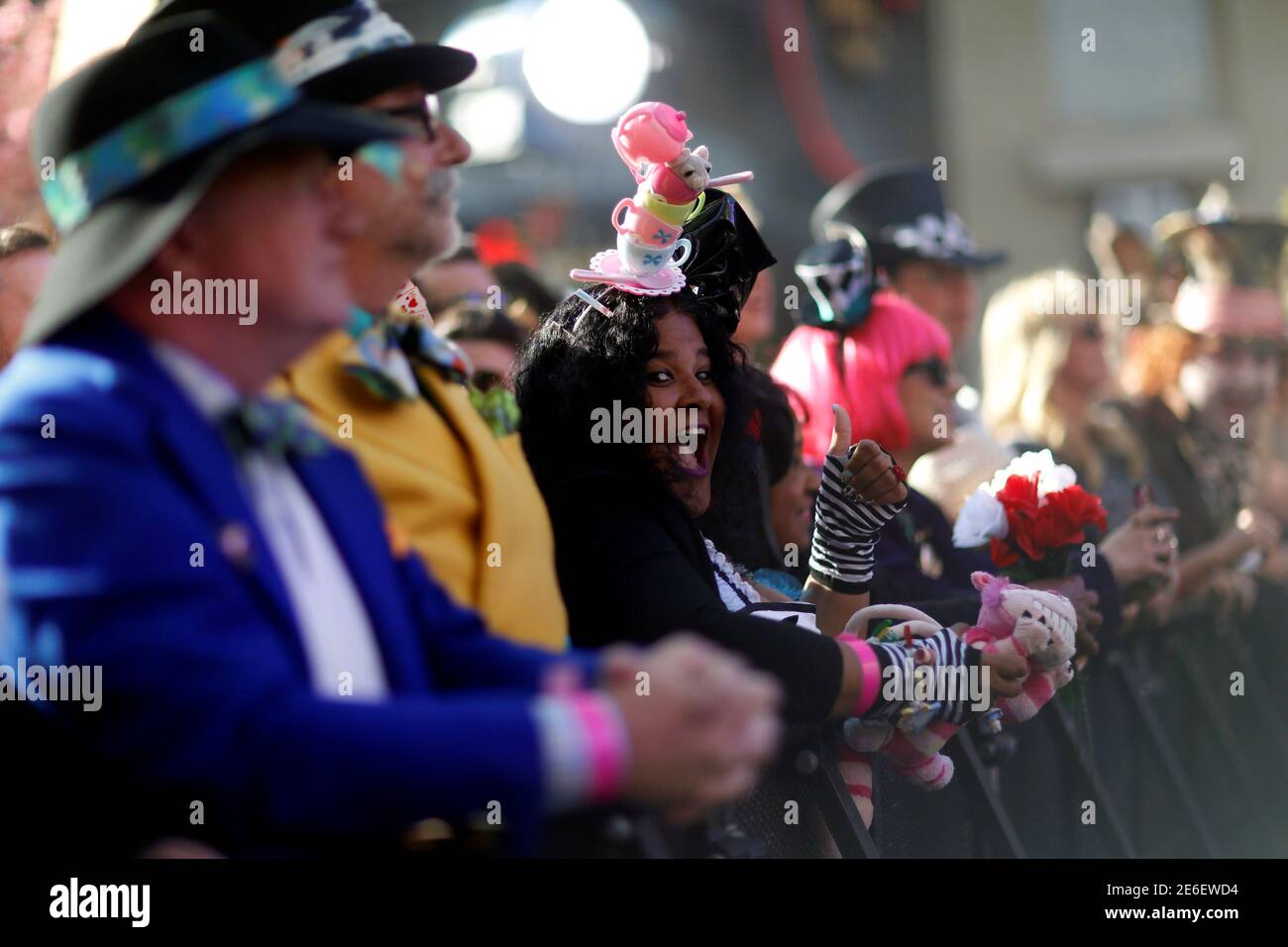 Fan Maria Sims wears a costume while waiting for a performance by ...