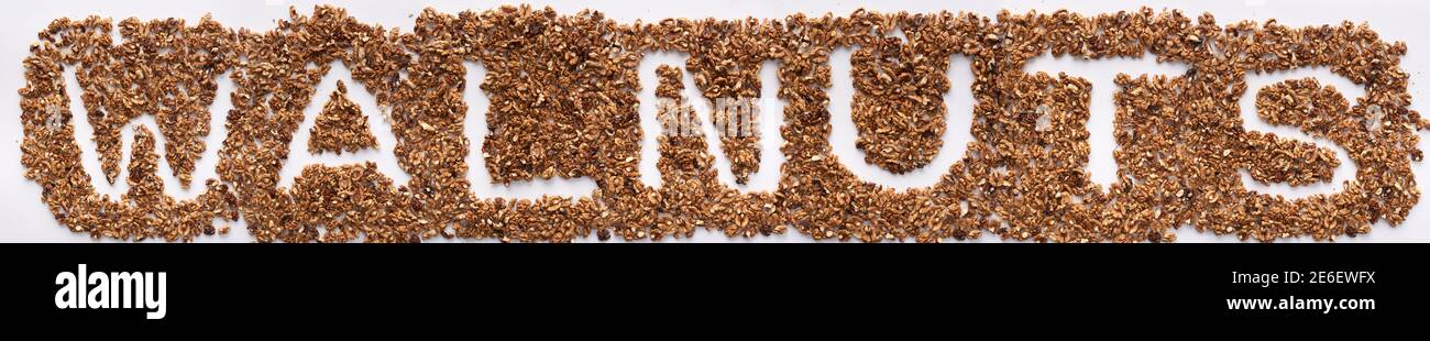 Word WALNUTS written within a pile of walnuts Stock Photo - Alamy