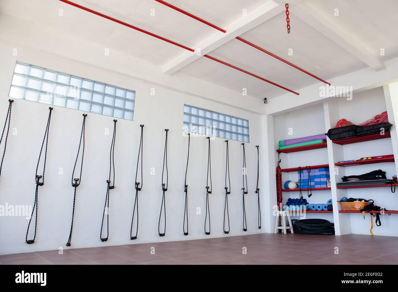 gym and fitness equipment. Sports room. Different tools for fitness ...