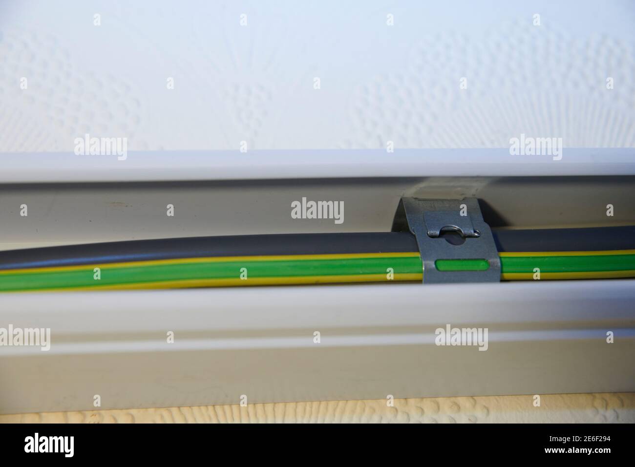 Metal retention clips in electric trunking used as a safety device for ...