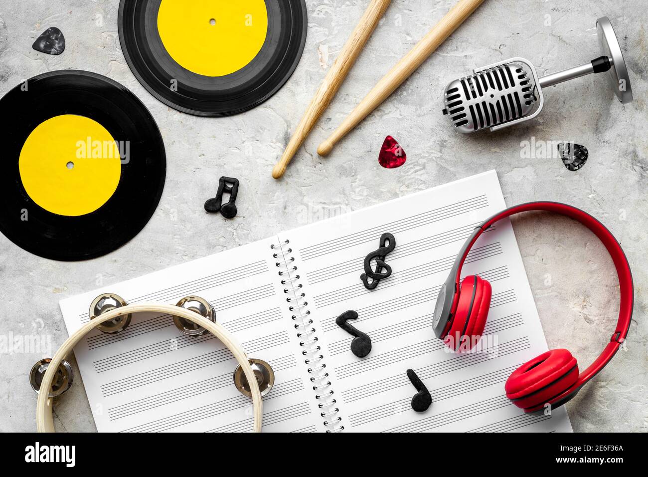 Flat lay of music background - instrument with sheet music, top view ...