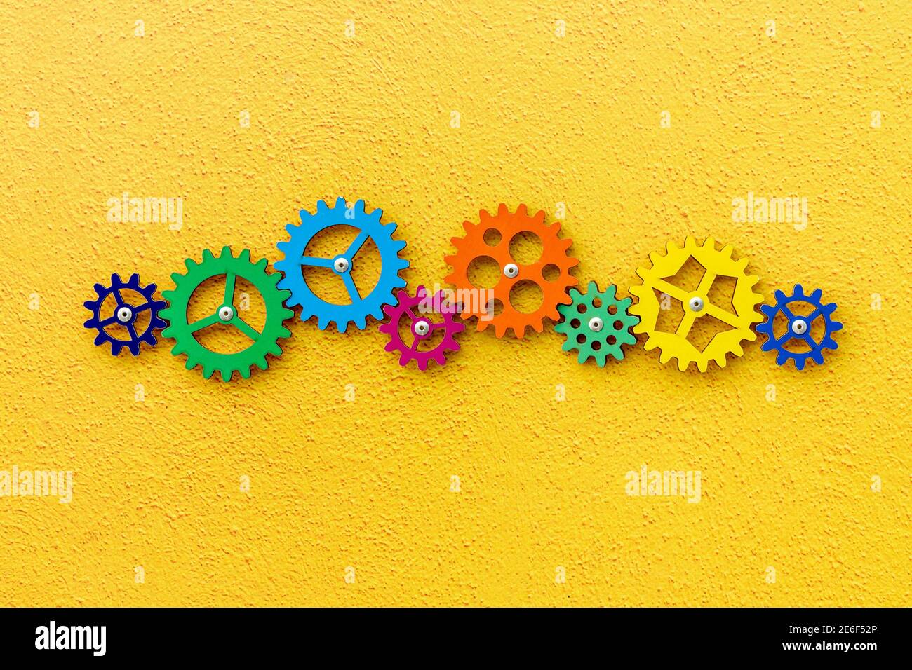 Top view of colorful gears. Corporate work and modern business process ...