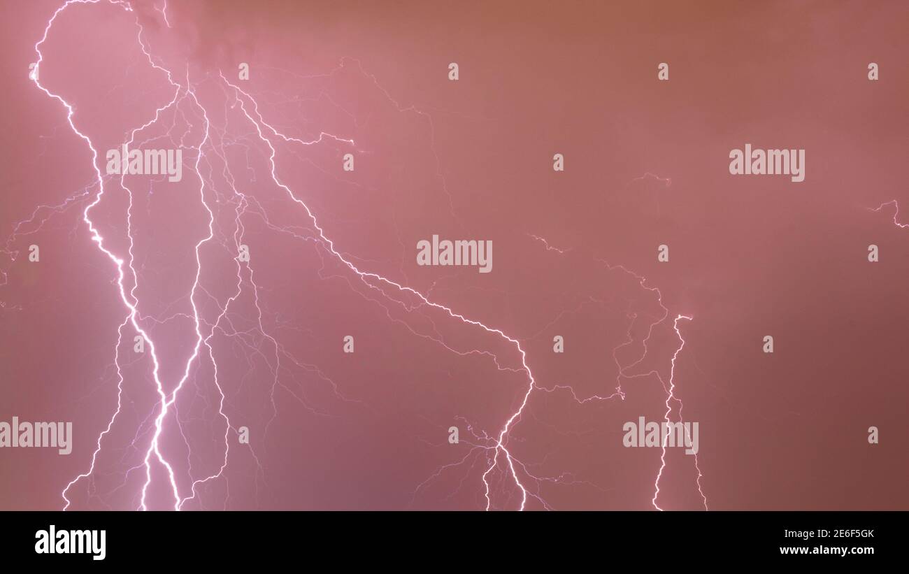 Lightnings in the clouds. Strong storm background photo. Weather banner ...