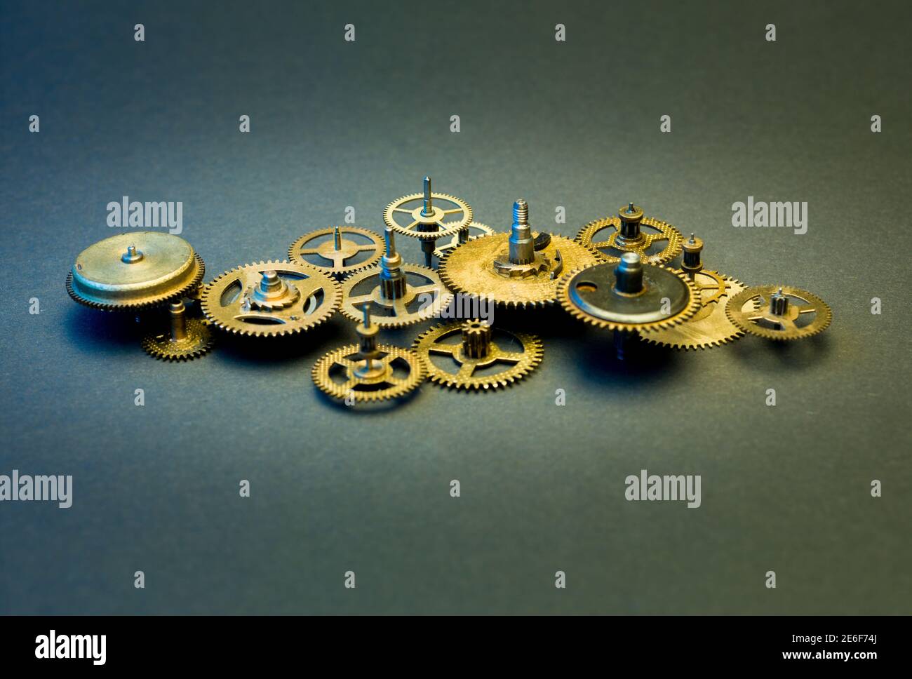 Mechanical collage made of clockwork gears on paper background Stock ...